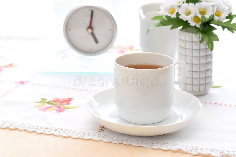 Tea and clock stock image. Image of service, product - 86571337