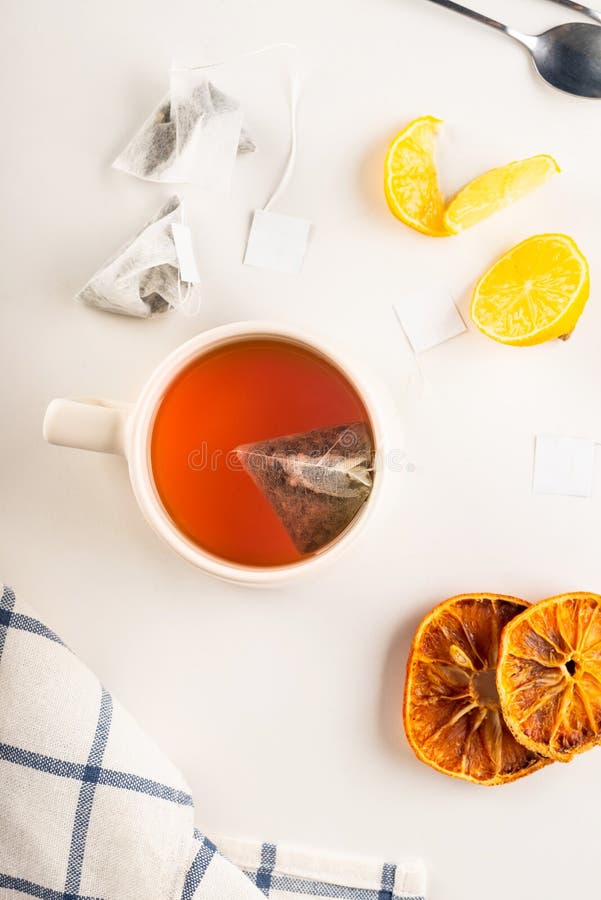 Tea Composition Teapot and Teacup with Tea Bags on White Table. Flat ...