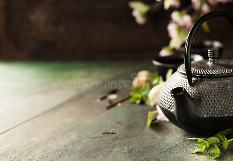 Tea Concept, Cups with Tea and Traditional Teapot Decorated with Stock ...