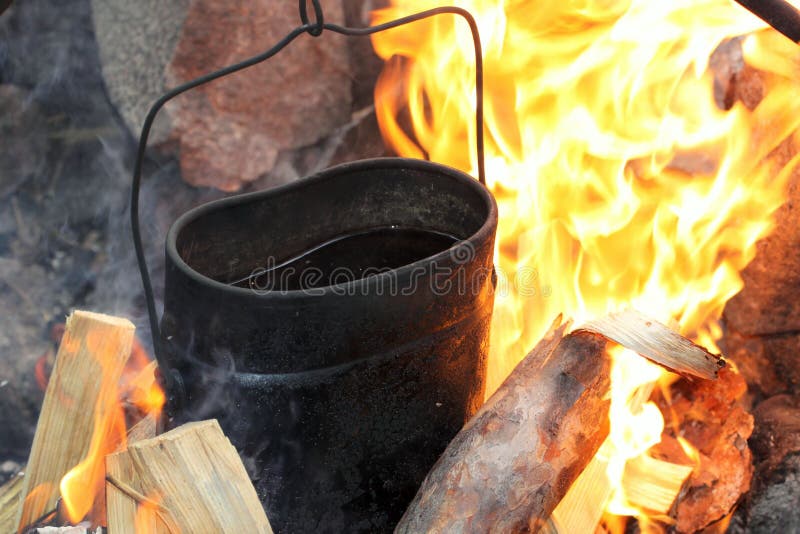 Tea, cooked on fire stock image. Image of cauldron, firewood - 32090281