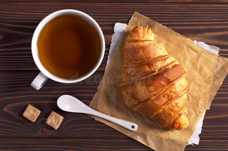 Tea and croissant stock photo. Image of baked, snack - 94985460