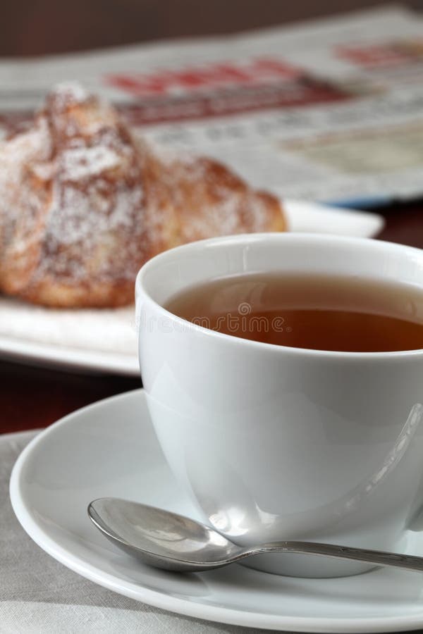 Tea, Croissant and Newspaper Stock Photo - Image of fresh, white: 14415964