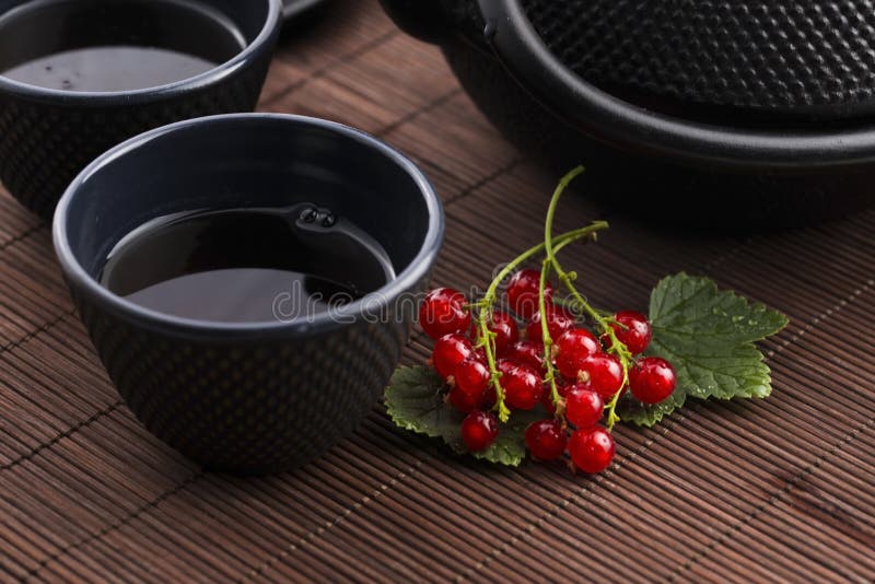 Tea in Cup and Fresh Currant Stock Photo - Image of cluster, plant ...