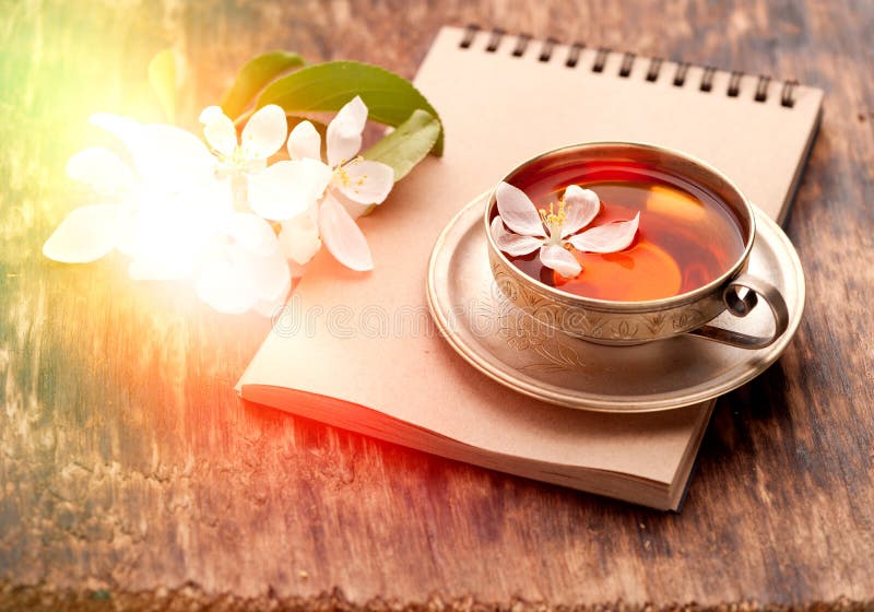 Tea Cup, Notebook and White Spring Flowers Stock Image - Image of ...