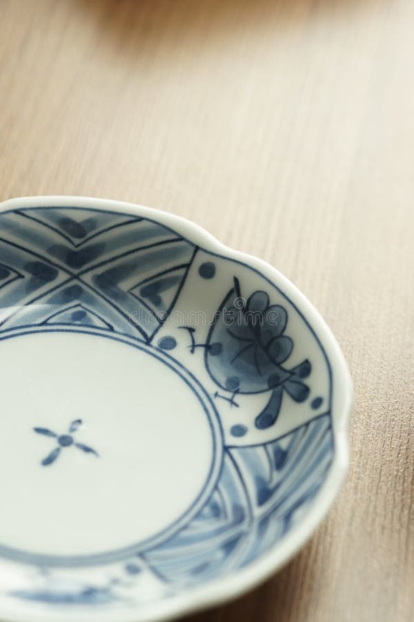 Tea cup plate on table. stock photo. Image of three - 182436696