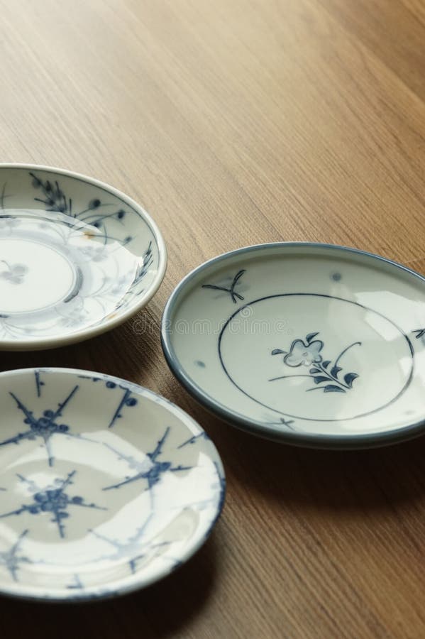 Tea Cup Plates Set on Table. Stock Photo - Image of style, wooden ...