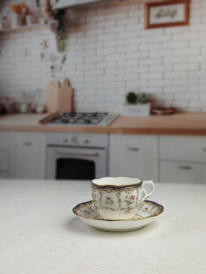 A Tea Cup and Saucer at the Modern Kitchen Stock Image - Image of ...