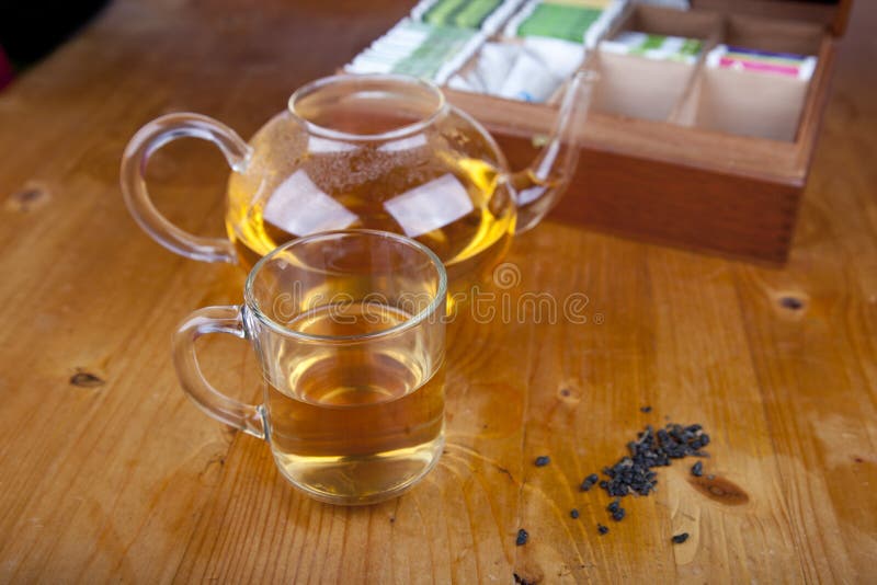 Tea Cup with Tea on Wooden Table Stock Photo - Image of kitchen, drink ...