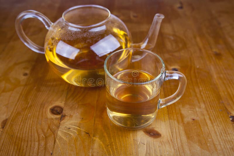 Tea Cup with Tea on Wooden Table Stock Photo - Image of full, closeup ...