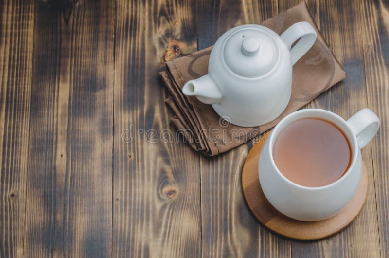Tea. Cup of Tea and Teapot. White Ware on a Wooden Table Stock Image ...