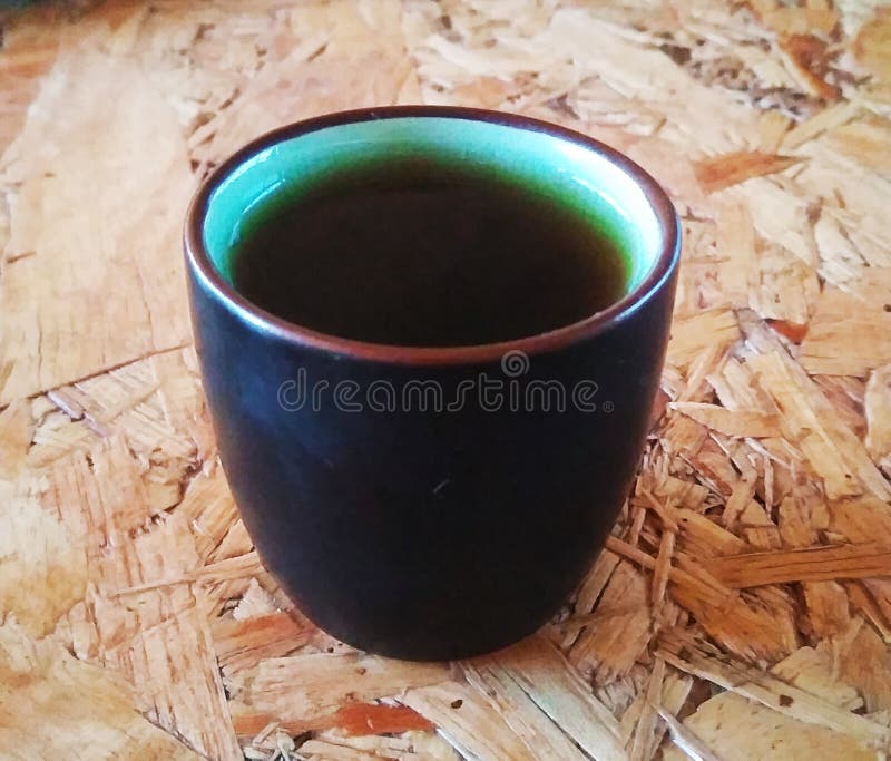 Tea cup on wood stock image. Image of wood, black, cafe - 146443489