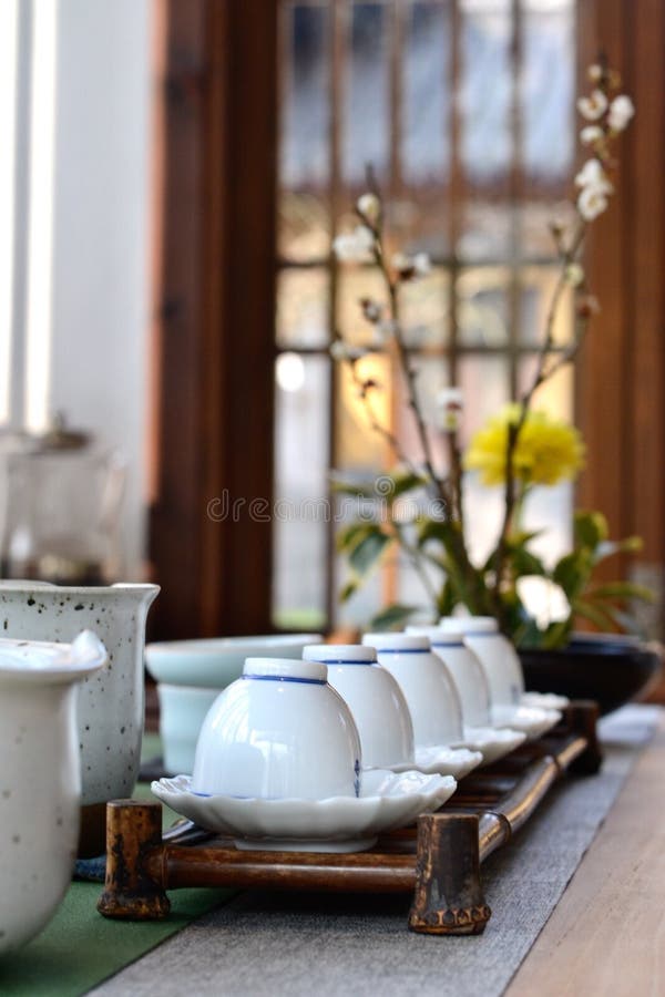Tea cups on rack stock photo. Image of table, indoor - 88403484