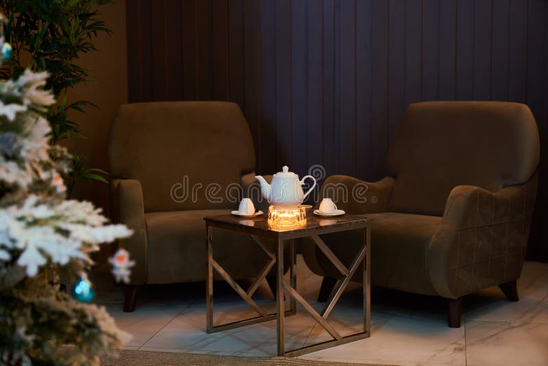 Tea Drinking Area, on the Table There is a White Tea Kettle, Next To ...