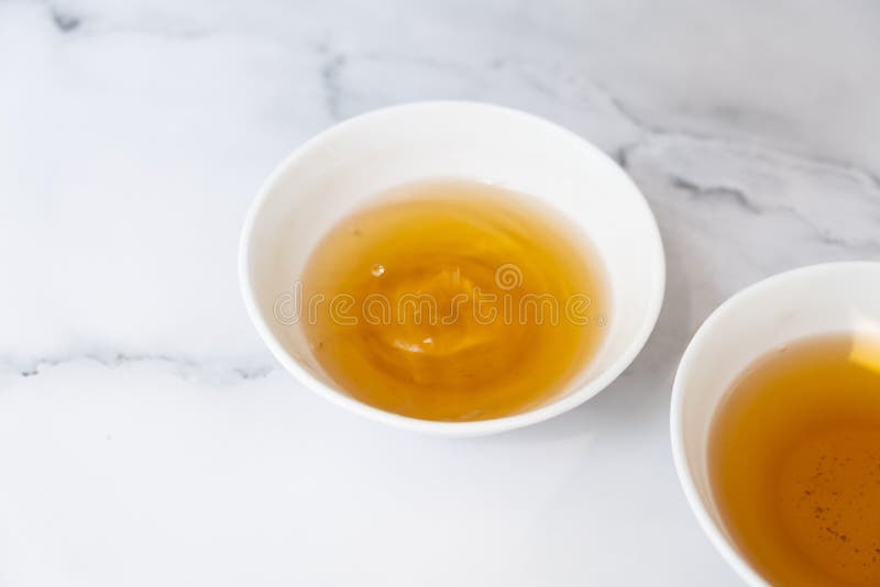 Tea Drops Fall into a Cup. Tea Ceremony Concept Stock Image - Image of ...
