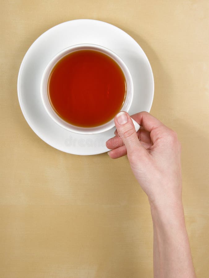 Tea - Female Hand Holds a Cup of Tea on Wood Table Stock Photo - Image ...