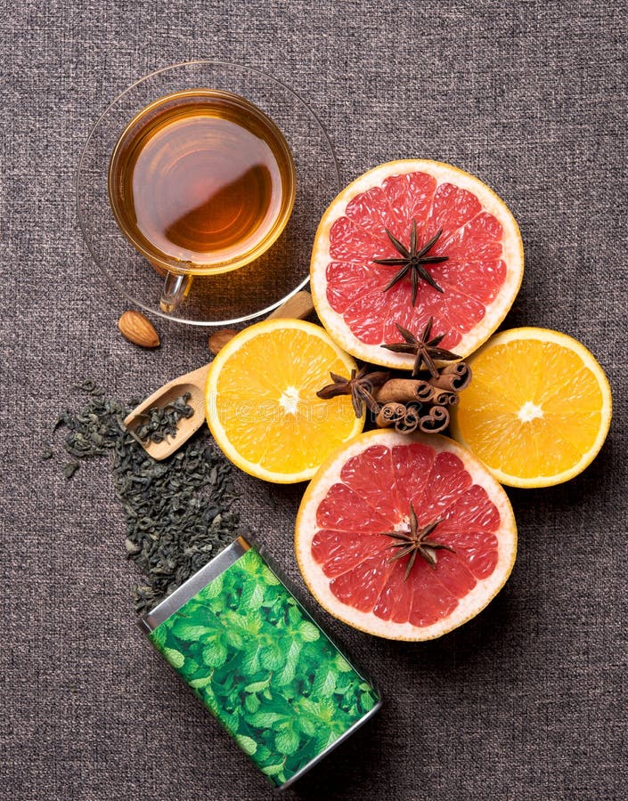 Tea with Fresh Citrus Fruits Stock Photo - Image of wooden, cinnamon ...