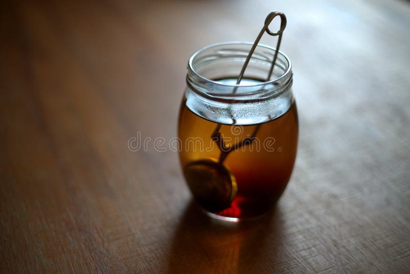 Tea in a Glass Jar on Table Stock Image - Image of wood, colorfull ...