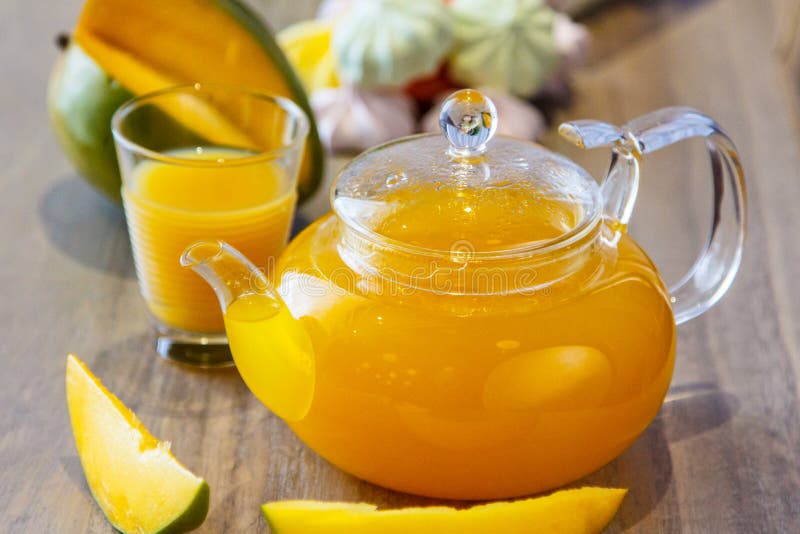 Tea in a Glass Teapot of Mango Stock Image - Image of mango, lemon ...