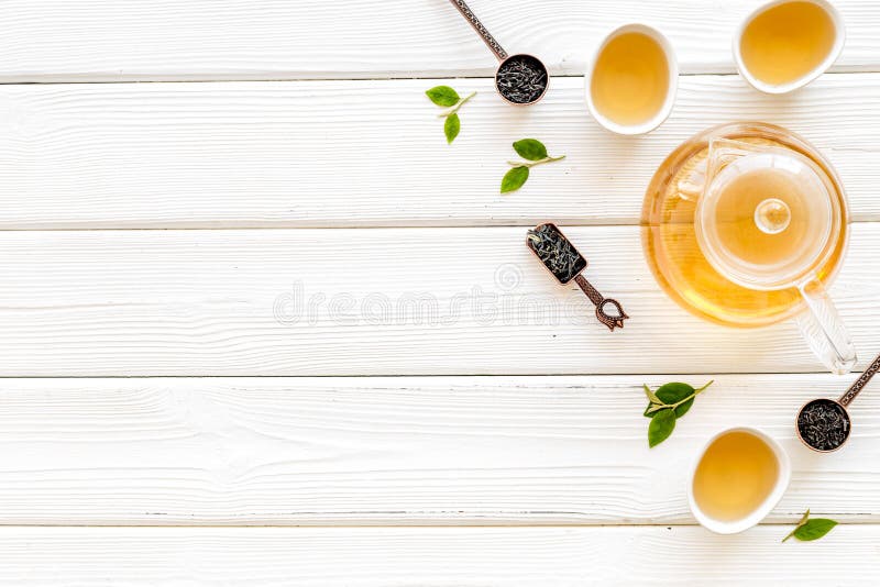 Tea Green Leaves with Teapot and Cups, Top View. Tea Ceremony Concept ...