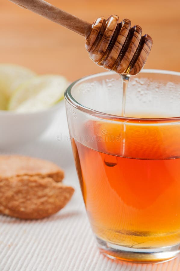 Honey dripping into tea stock photo. Image of drink, relaxation - 473560