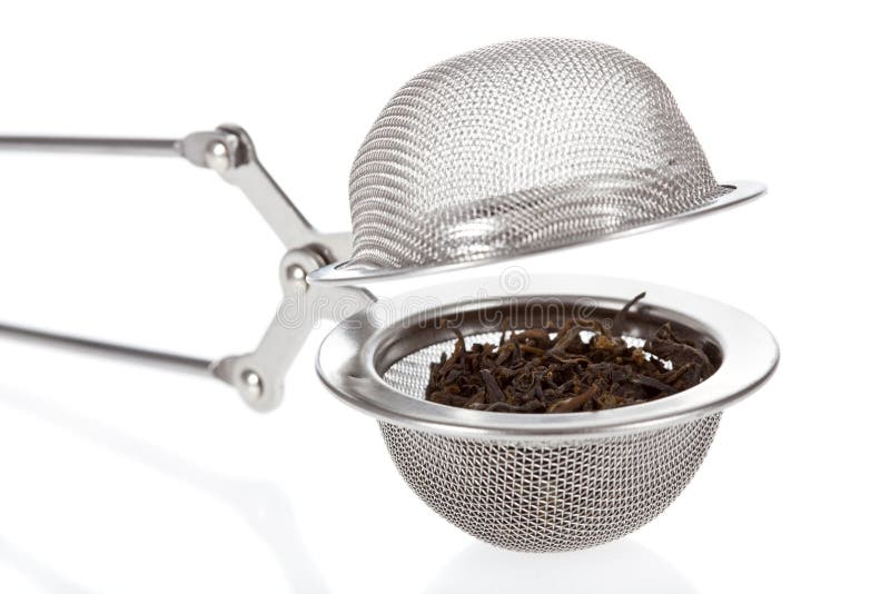 Tea Infuser with Green Tea Leaves Stock Image - Image of silver ...