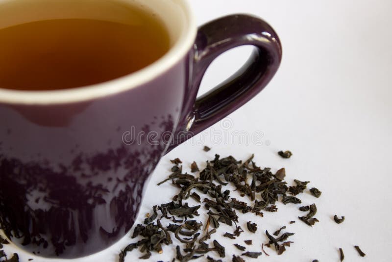 Tea leaves by cup stock photo. Image of beverage, blend - 5928632
