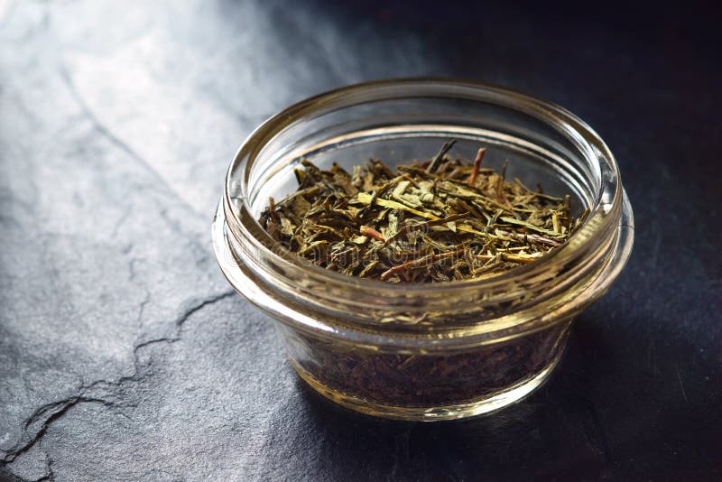 Tea Leaves on the Glass Jar on the Stone Background Horizontal Stock ...