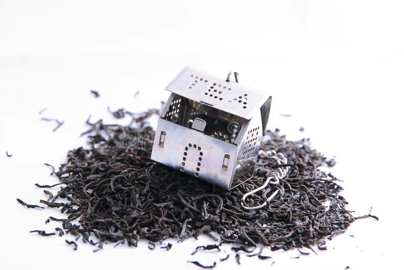 Tea leaves and small house stock image. Image of chain - 13095785