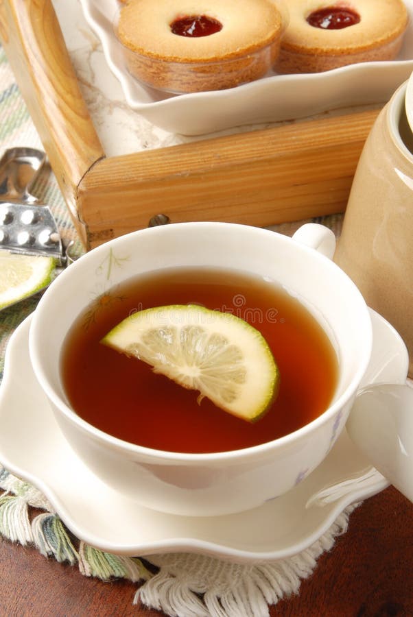 Tea with a lemon stock photo. Image of dark, healthy - 19459784