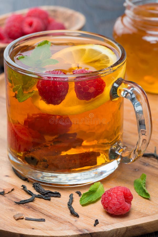 Tea with Lemon, Mint, Raspberry and Cinnamon, Close-up Stock Image ...