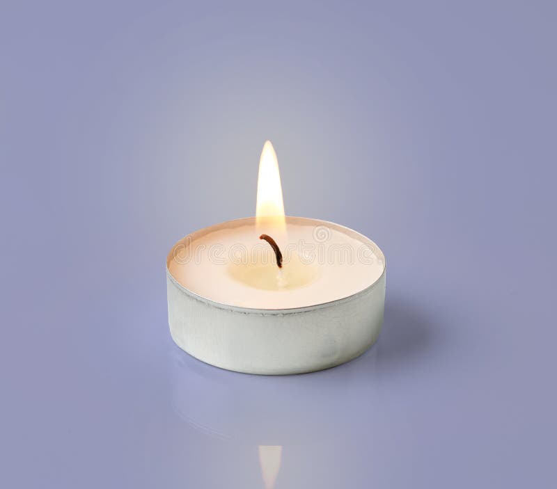 Tea Light Candle in the Dark. Stock Photo - Image of dark, glow: 238553706