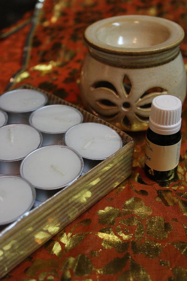 Tea Lights, Natural Essential Oil and Candle Diffuser Editorial Photo ...