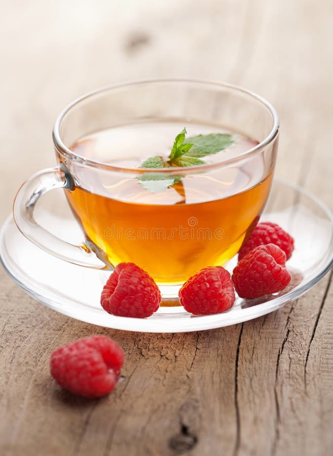 Tea with mint and berry stock image. Image of health - 21748233