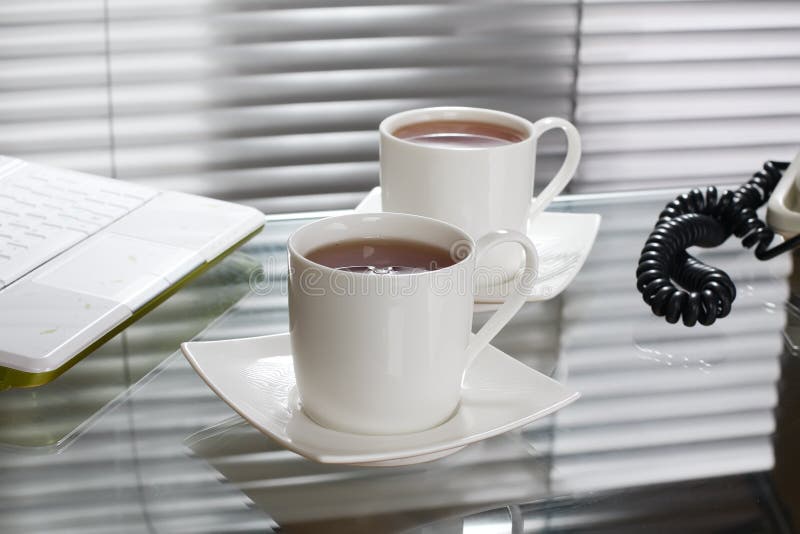 Tea at office stock image. Image of tableware, glass, white - 9339031