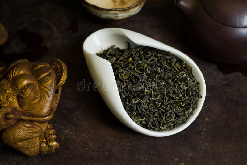 Tea leaves pile on table stock image. Image of china - 51411569