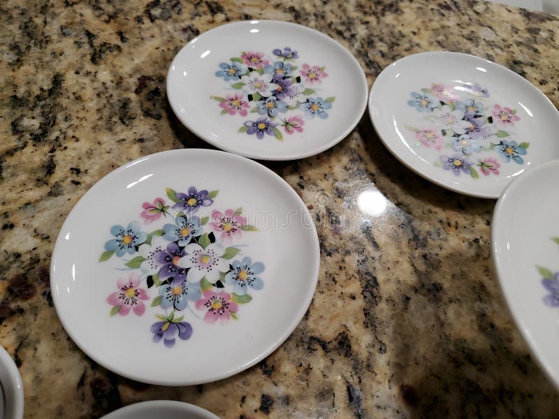 Tea plates with flowers stock photo. Image of pink, meal - 209642218