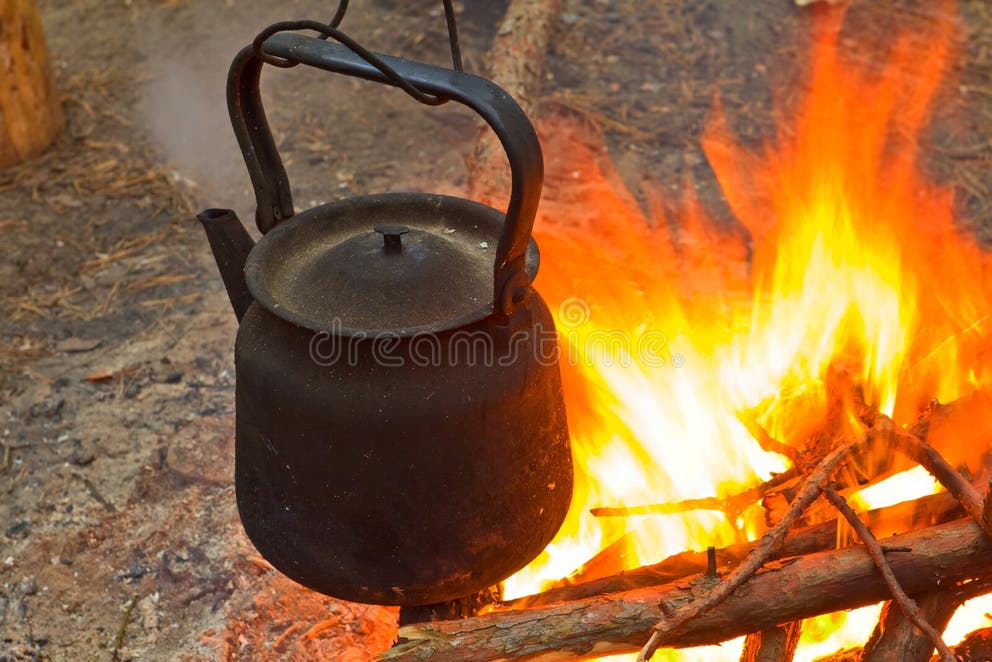 Tea-pot on a fire stock photo. Image of outdoor, woodpile - 22387902