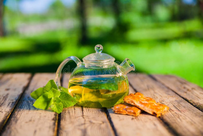 Tea Pot of Herbal Tea on a Wooden Table Stock Image - Image of ...
