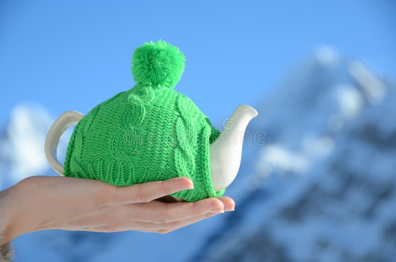 Tea pot in the knotted cap stock image. Image of cosy - 29939389