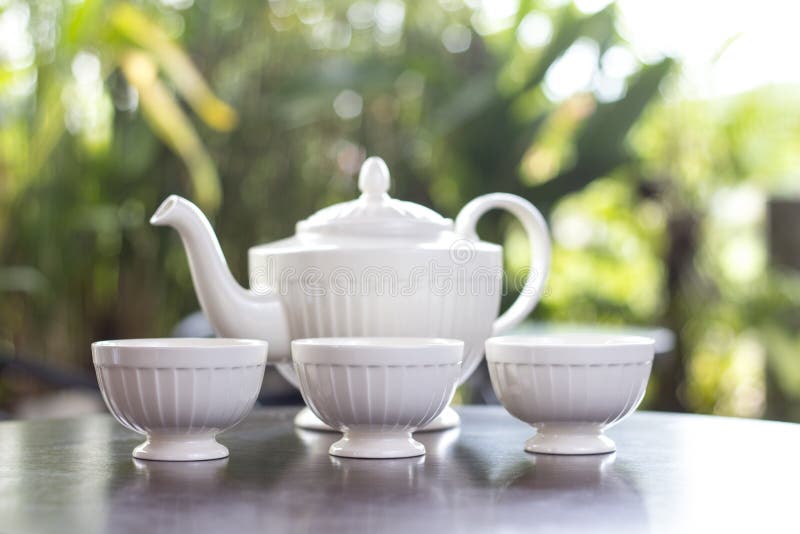 Tea Pot with Tea and Cup Delicious Stock Image - Image of glass, break ...