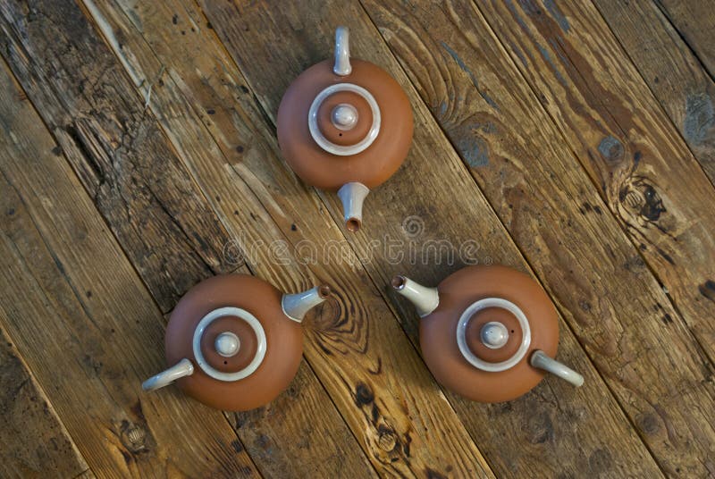 Tea Pots on a Wooden Table stock image. Image of england - 33418719