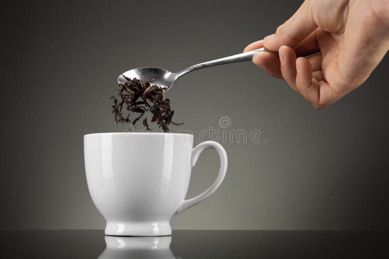 Tea Pour Out into White Cup Stock Image - Image of cafe, flavor: 23861379