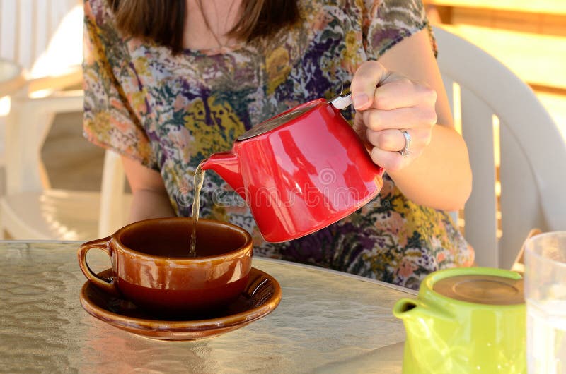 Tea Pour stock image. Image of brew, ceramic, teacup - 53396507