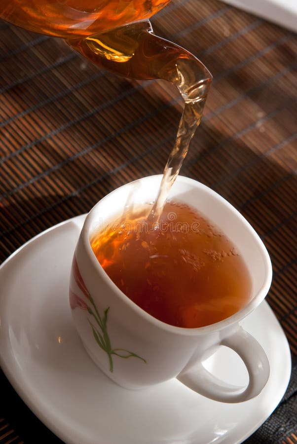 Tea pouring stock image. Image of liquid, drink, thirst - 18570287