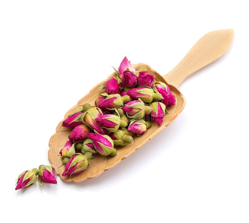 Tea Rose Flowers in a Wooden Spoon Isolated Stock Photo - Image of ...