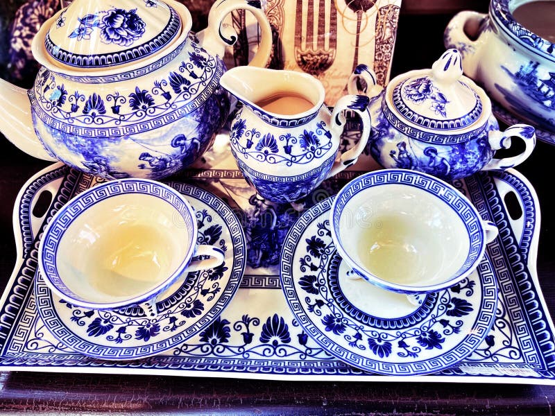 Tea set stock photo. Image of teapot, saucers, bowl - 257637708