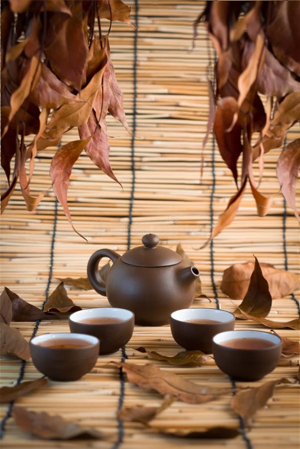 Tea Set with Bamboo Mat and Brown Leaf Stock Photo - Image of aroma ...