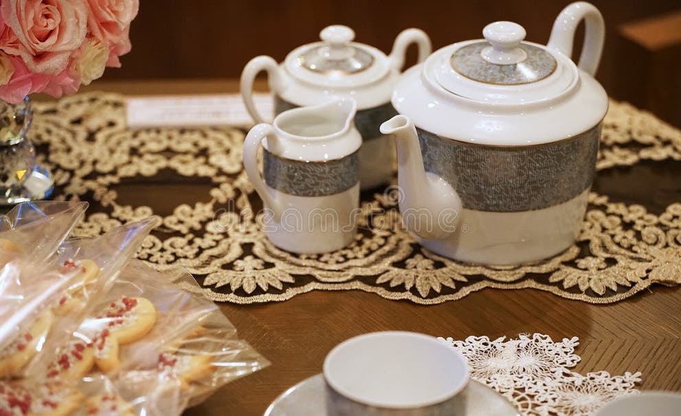 Tea set of the table stock image. Image of rose, drink - 203948489