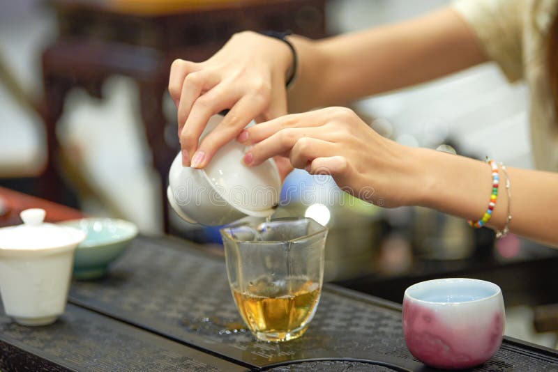 A Tea Sommelier is Making Tea for a Customer Stock Photo - Image of ...
