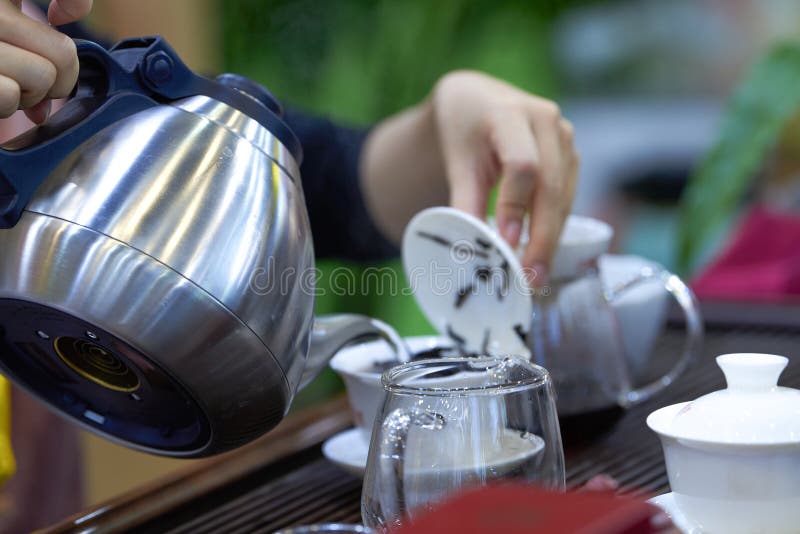 A Tea Sommelier is Making Tea for a Customer Stock Image - Image of ...
